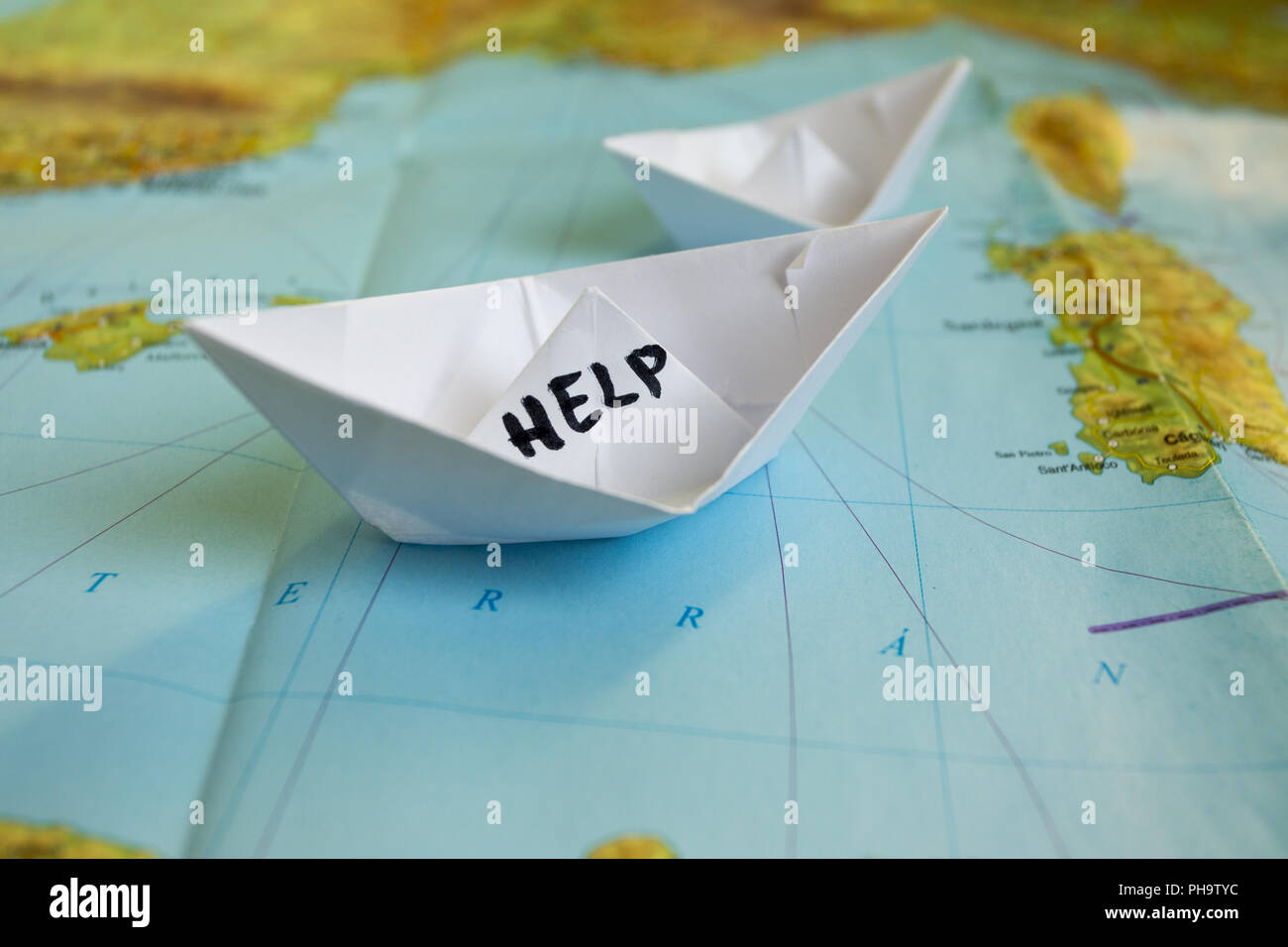 Paper Boat Map Help Refugees Stock Photo - Alamy
