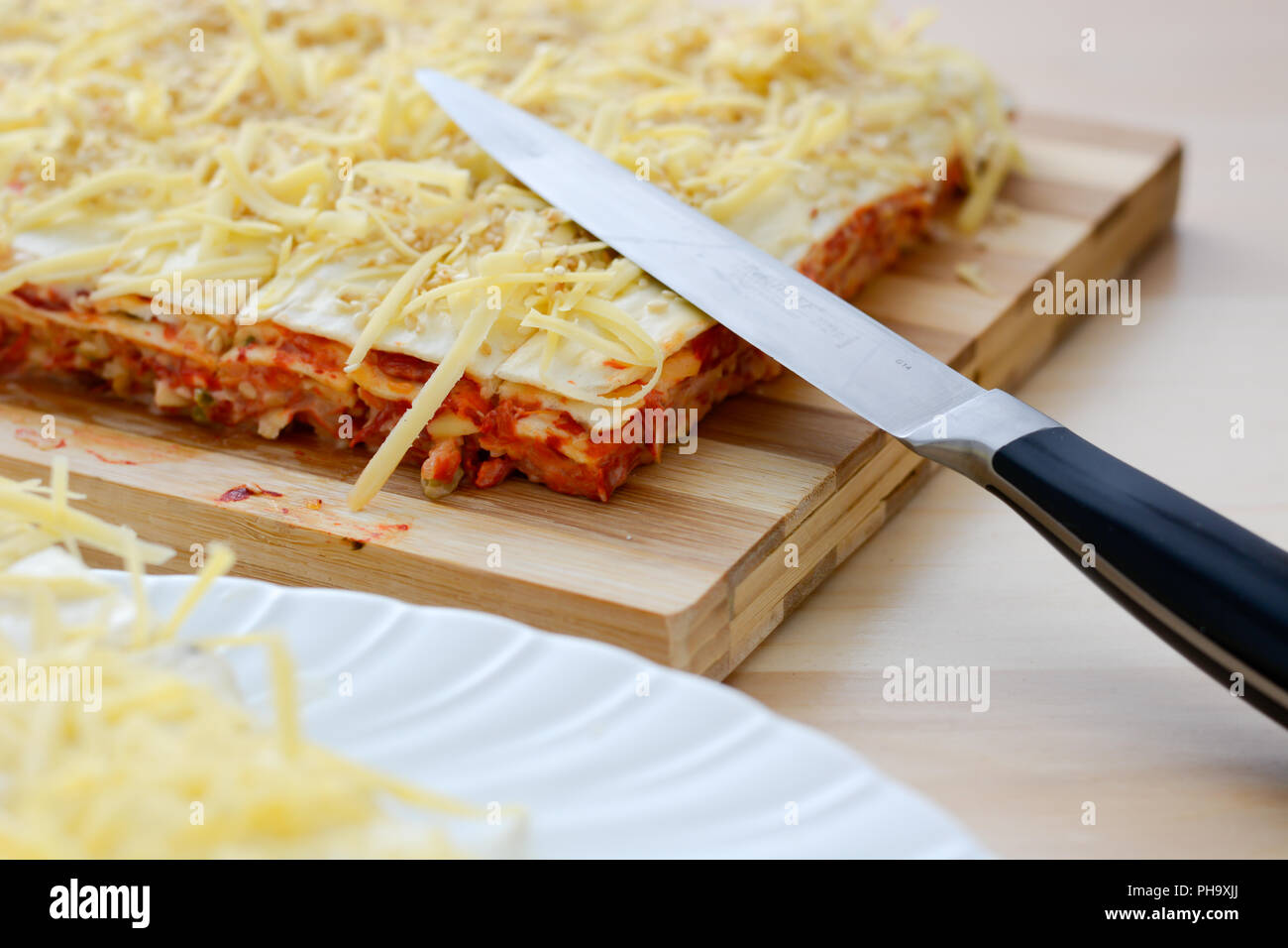 Salt cake with cheese and red paprika Stock Photo - Alamy