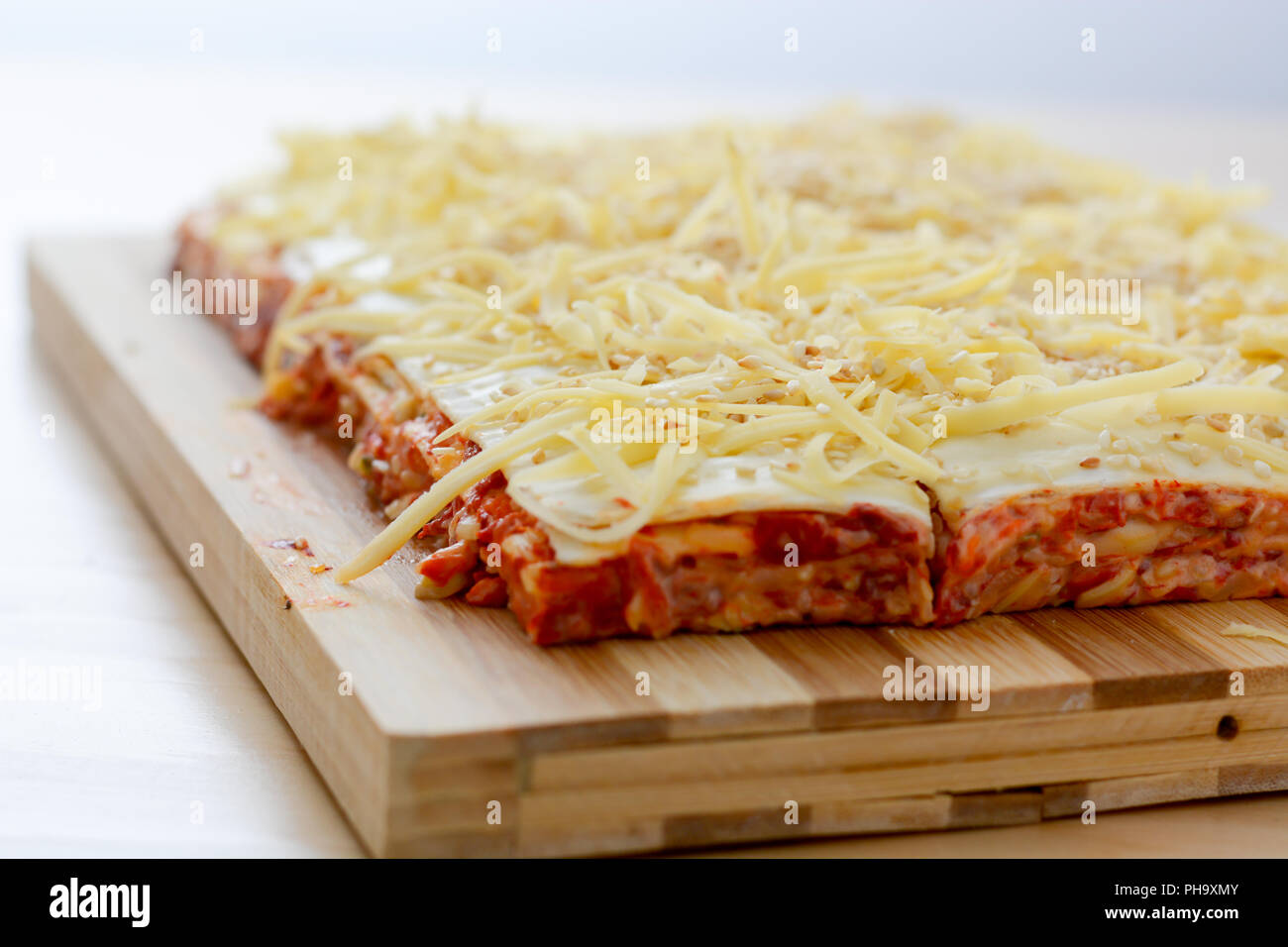 Salt cake with cheese and red paprika Stock Photo - Alamy