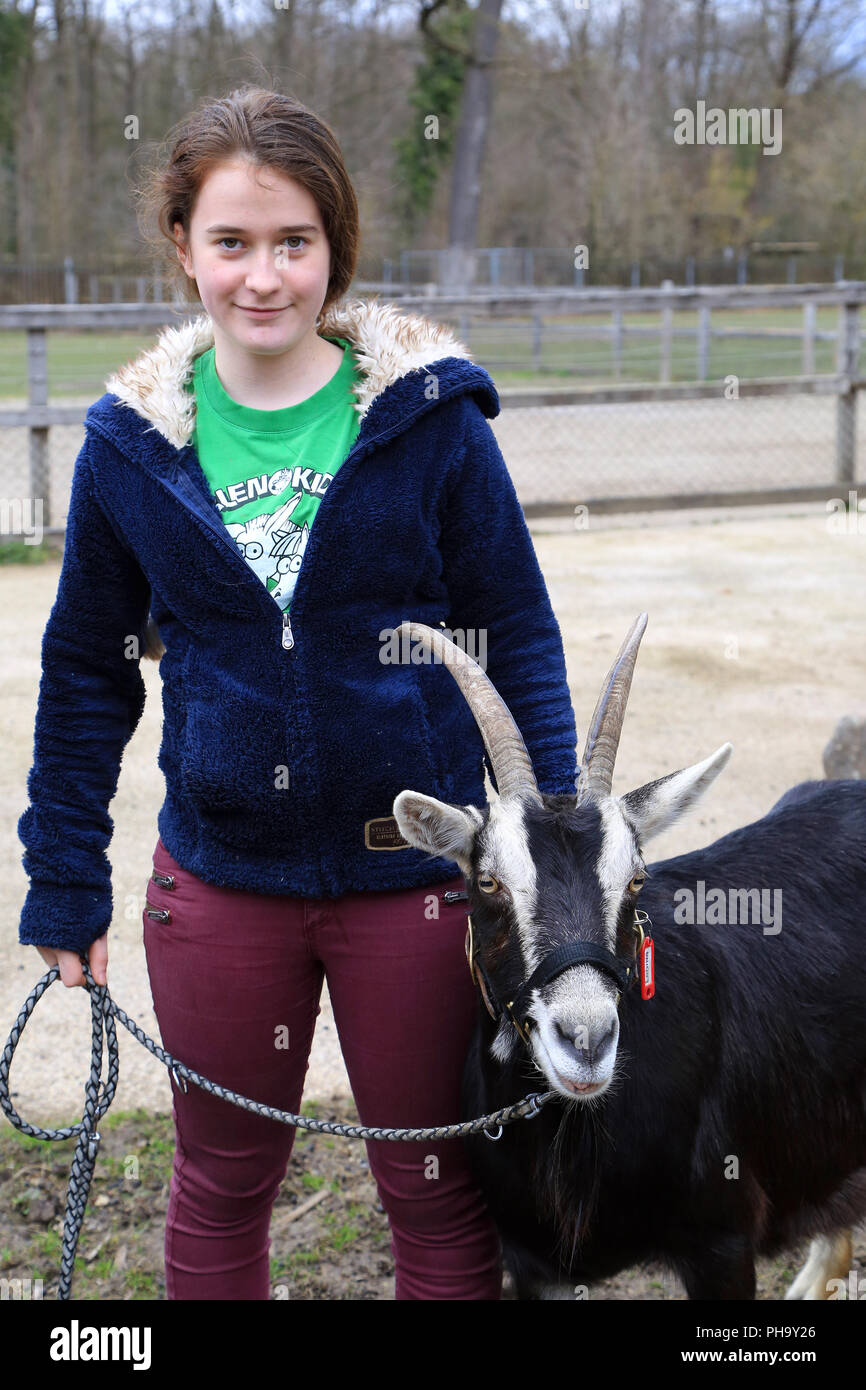 Woman with goat hi-res stock photography and images - Alamy