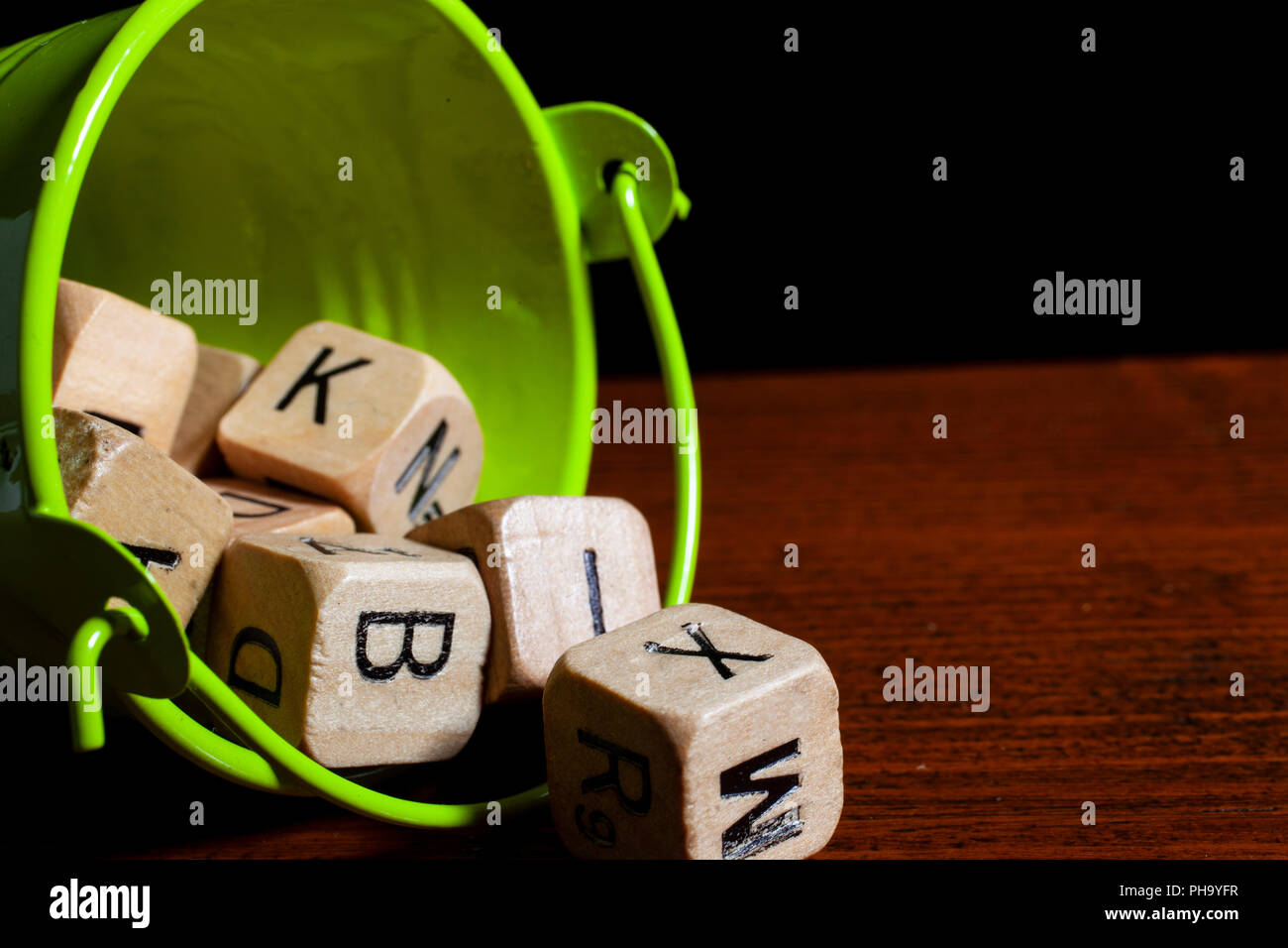 letter blocks in a bucket Stock Photo - Alamy