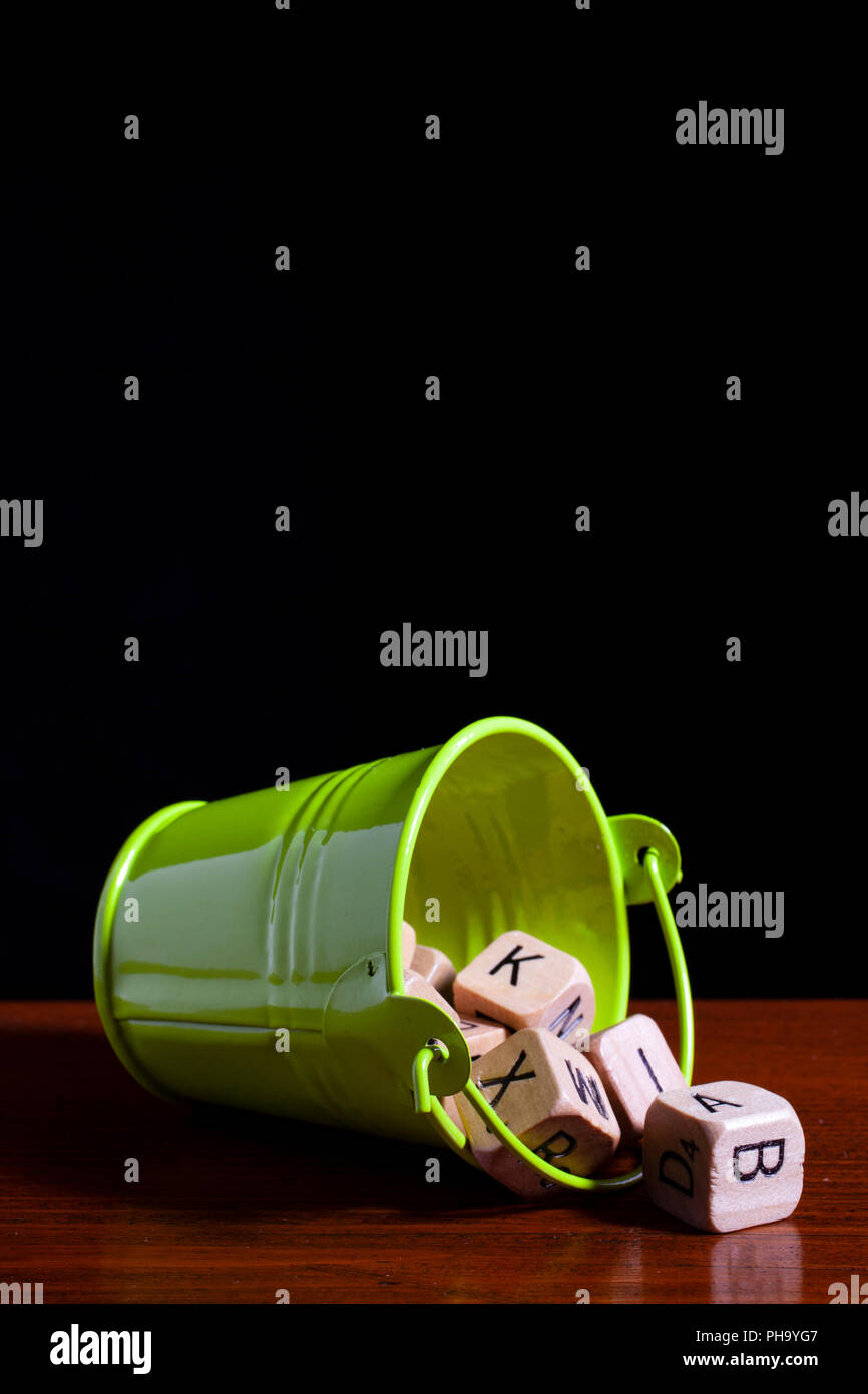 letter blocks in a bucket Stock Photo - Alamy