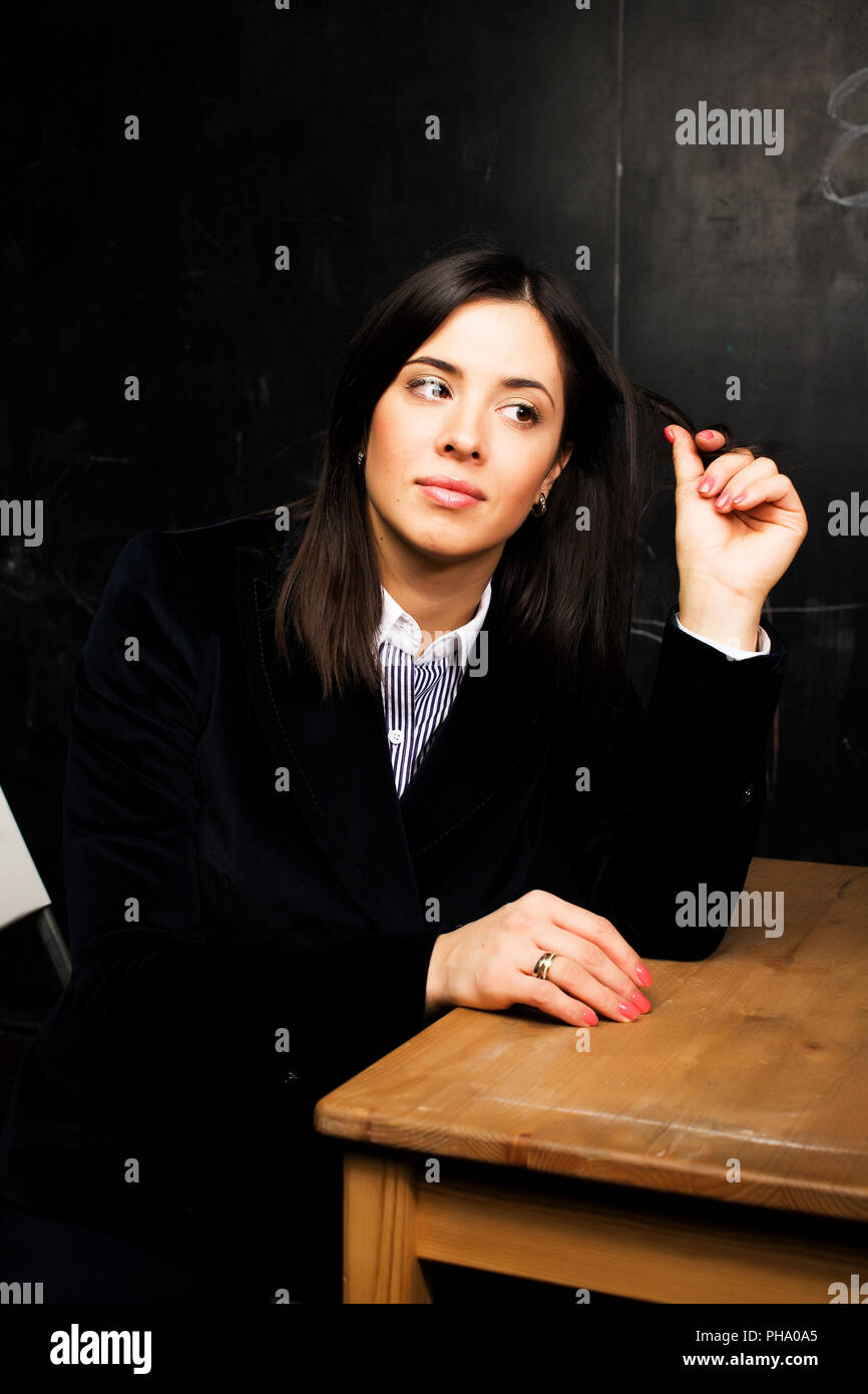portrait of happy cute student in classroom at blackboard back t Stock ...