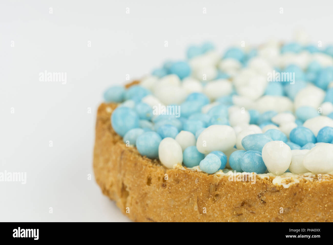 Rusks with traditional Dutch blue anise sprinkles Stock Photo - Alamy