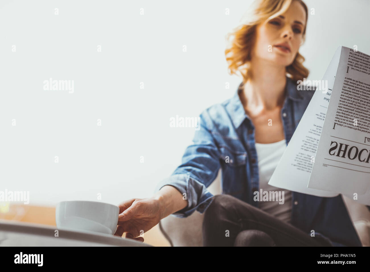 Gorgeous lady crossing her legs Stock Photo - Alamy