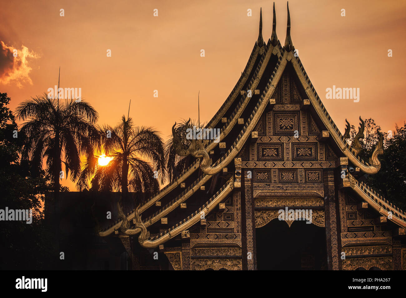 Sunset over temple in Chiang Mai, northern Thailand Stock Photo - Alamy