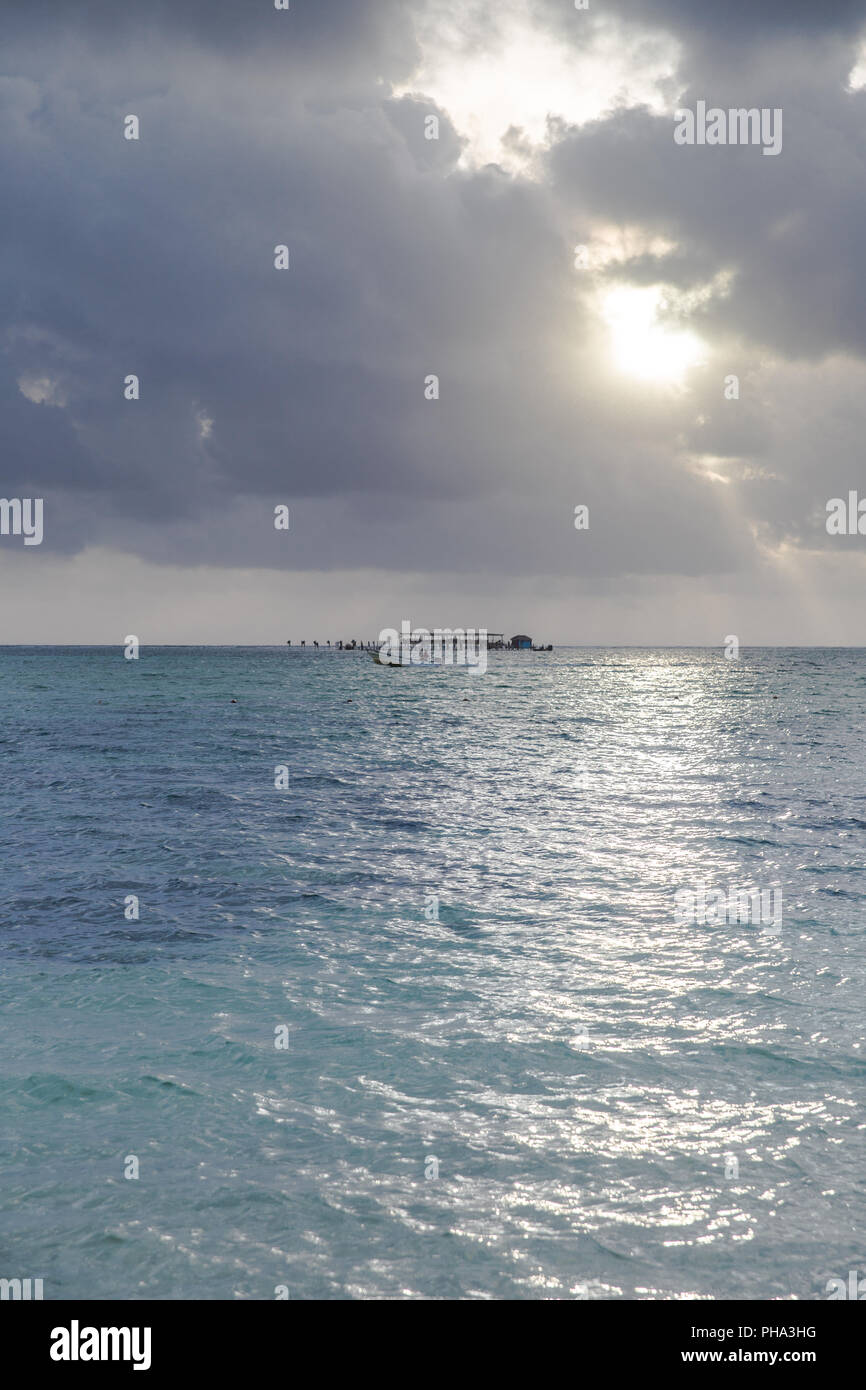 Sunrise over water Stock Photo - Alamy
