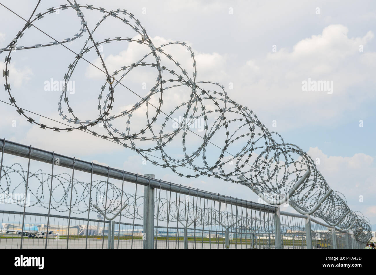 wire mesh fence prison / airport / military Stock Photo - Alamy