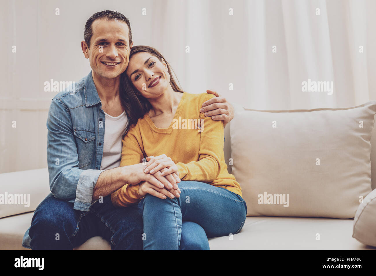 Female looking camera relaxed expression hi-res stock photography and ...