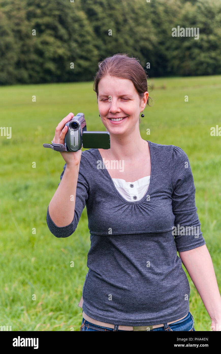 Filming with handycam hi-res stock photography and images - Alamy