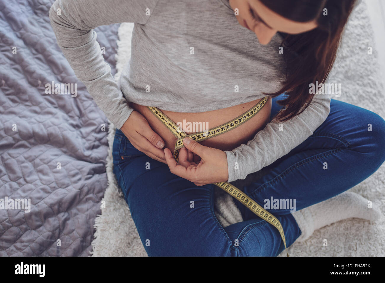 Close up pregnant woman measuring hi-res stock photography and images ...
