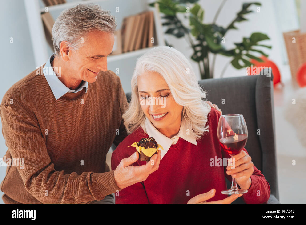 Charming female person looking at dessert Stock Photo - Alamy