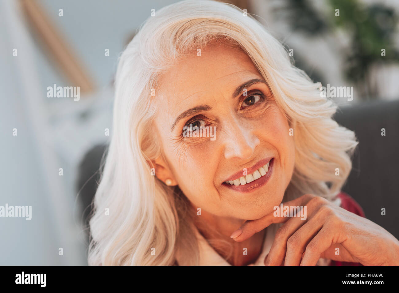 Amazing blonde demonstrating her pleasant smile Stock Photo - Alamy