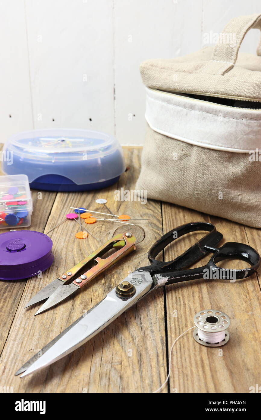 Sewing tools - scissors, pins, measuring tape Stock Photo - Alamy