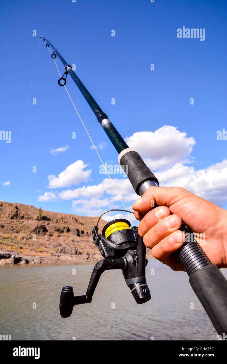 Fishing rod on lake hi-res stock photography and images - Alamy