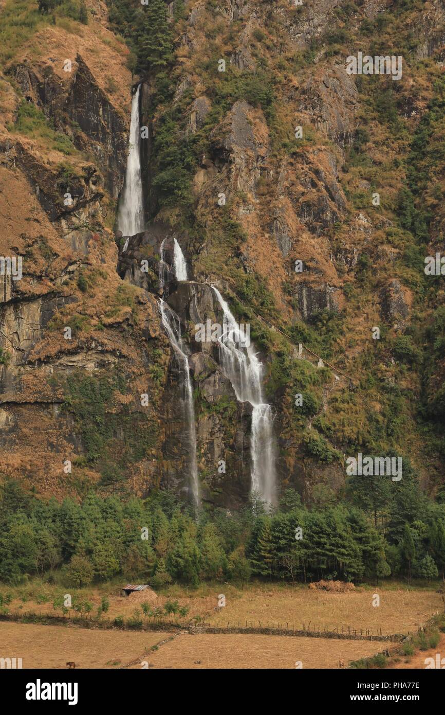 Tall waterfall in Tal, Annapurna Conservation Area Stock Photo - Alamy