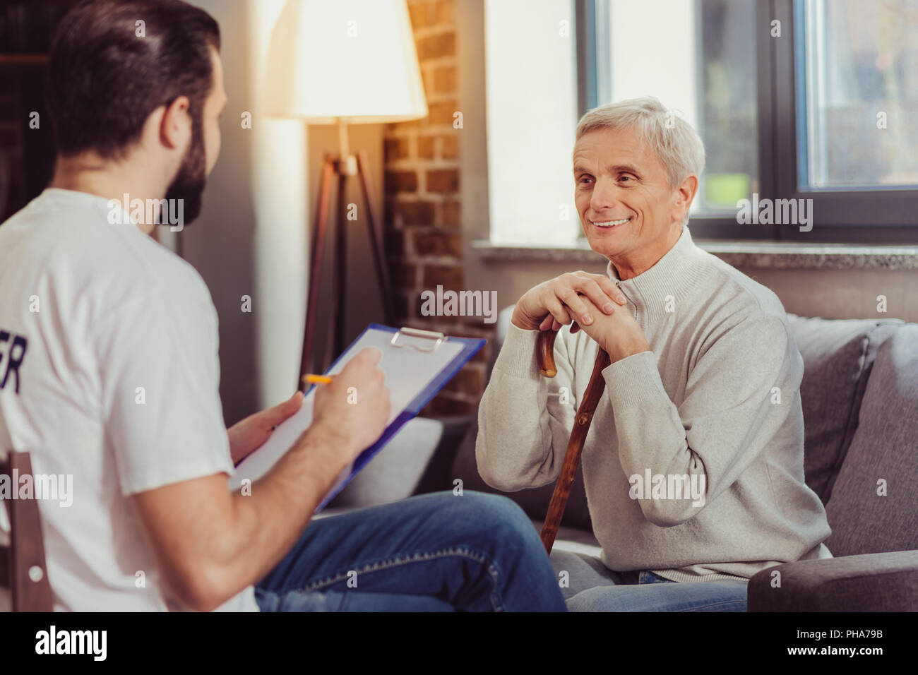 Smiling communication security sitting hi-res stock photography and ...