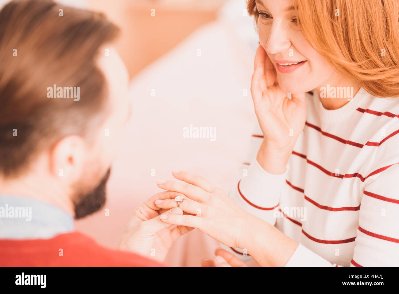 Nice engagement ring on the finger of nice woman Stock Photo - Alamy