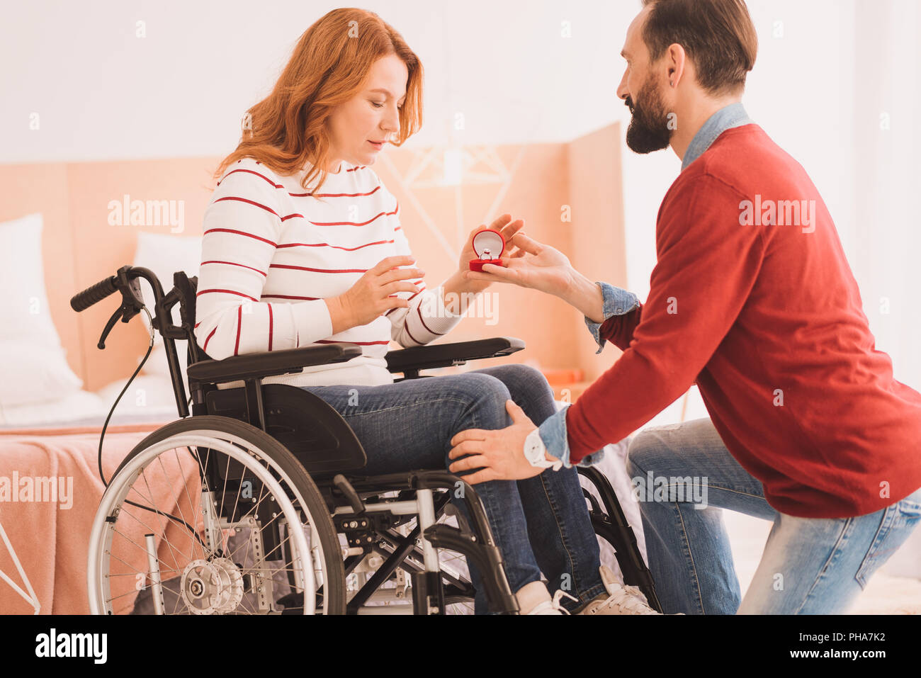 man making proposal with wedding ring and gift box Stock Photo - Alamy