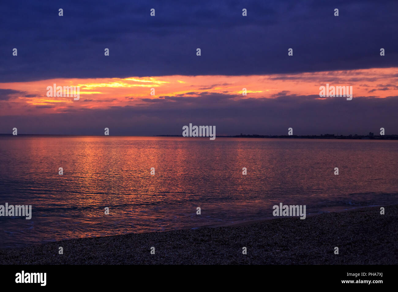 beautiful gloomy sunset sky over the sea Stock Photo - Alamy