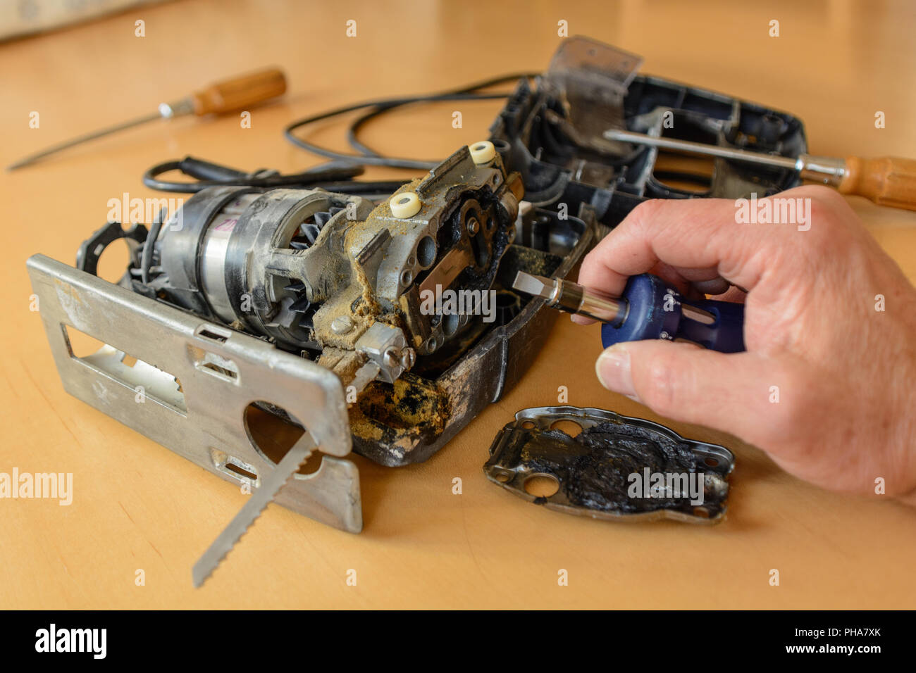 Repairing broken hi-res stock photography and images - Alamy