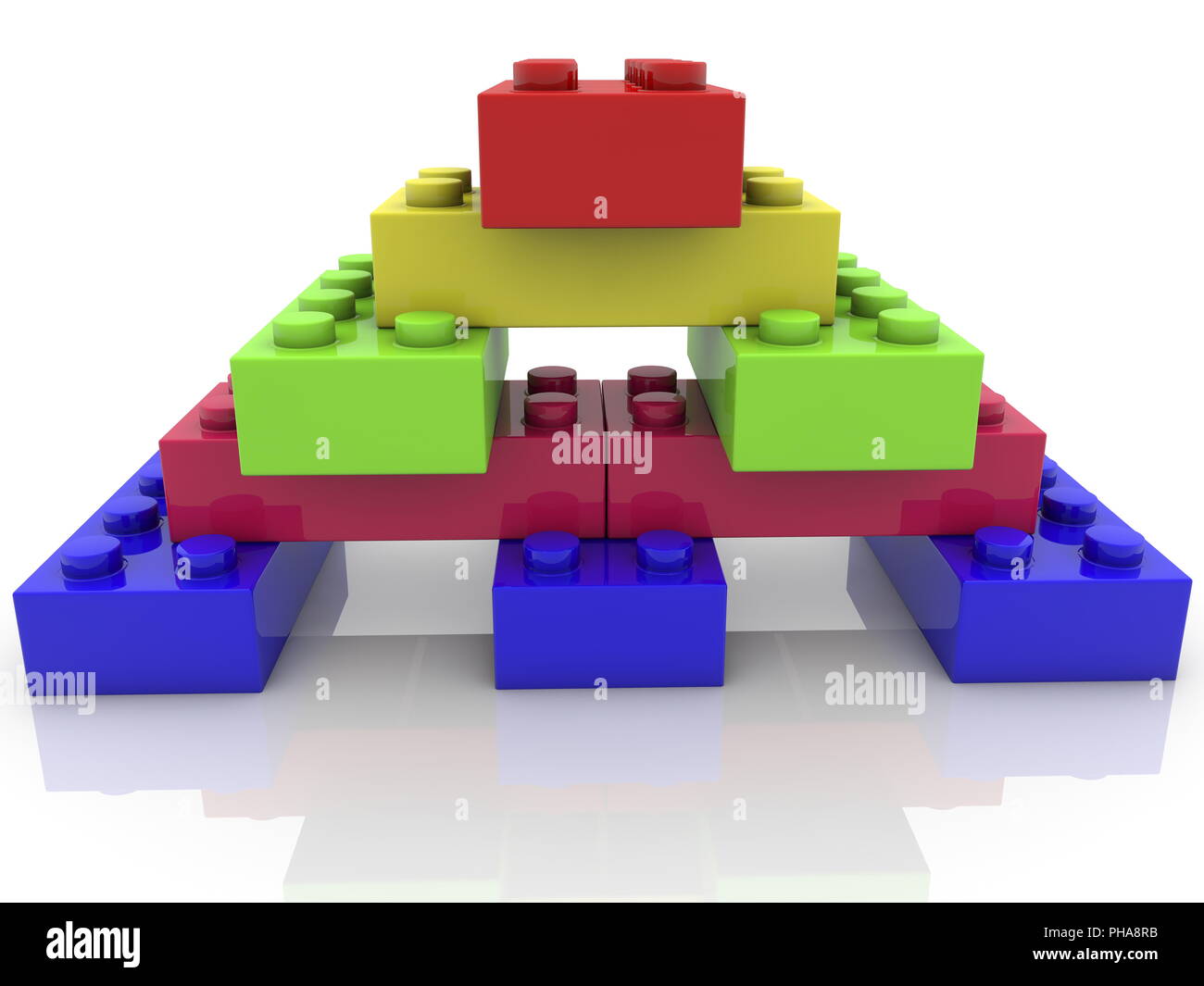Toy bricks stacked in pyramid on white Stock Photo - Alamy