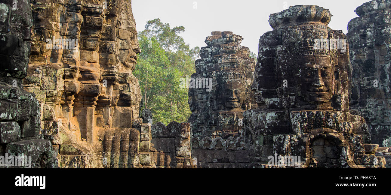 Faces columns in Bayon, Angkor, Cambodia Stock Photo - Alamy