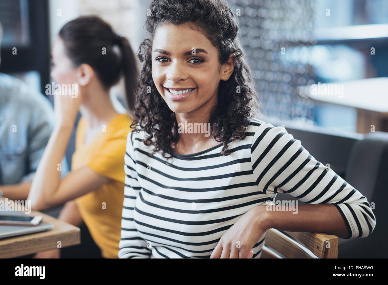 Happy beautiful woman grinning Stock Photo - Alamy