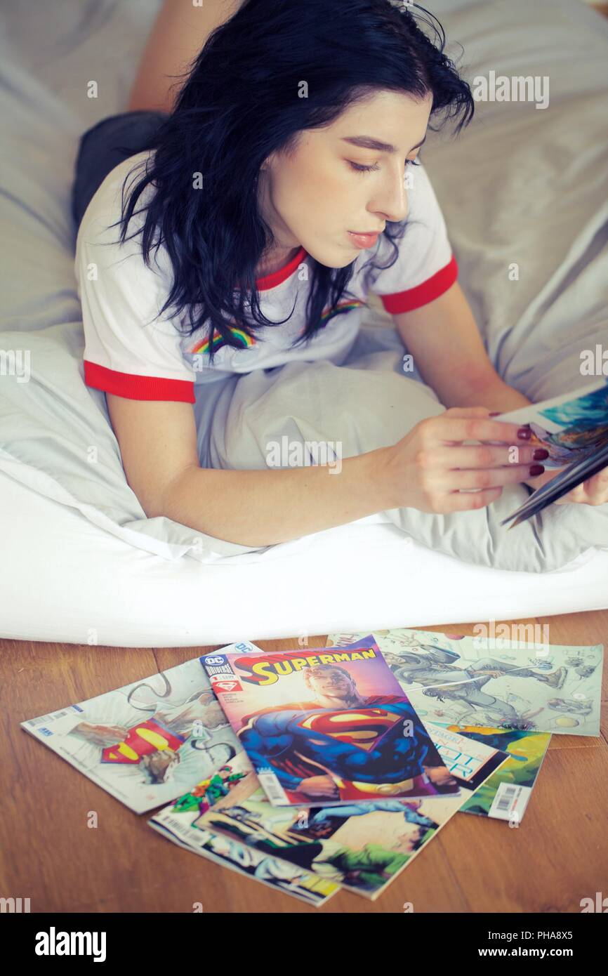 girl reading comics Stock Photo - Alamy