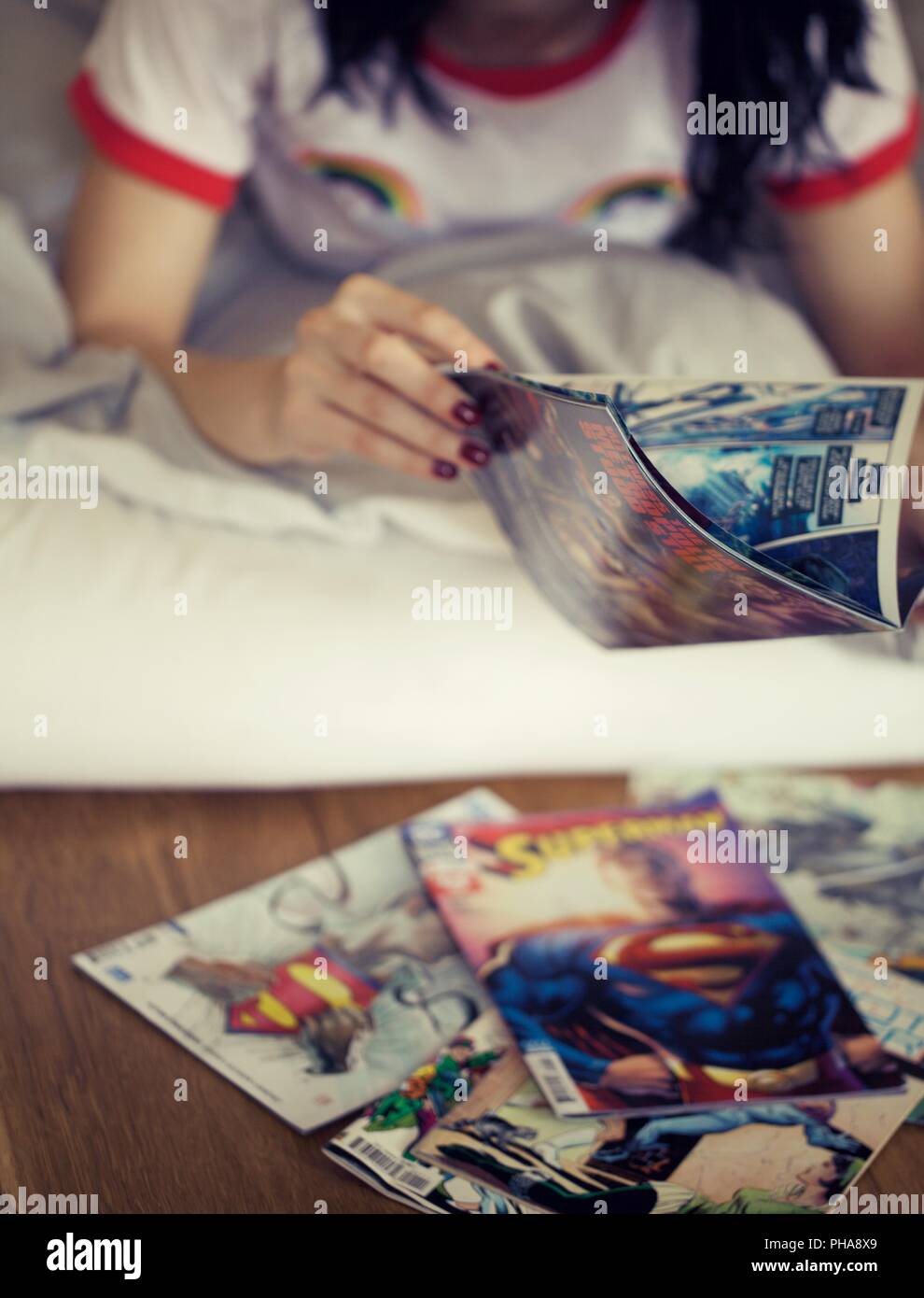 girl reading comics Stock Photo - Alamy