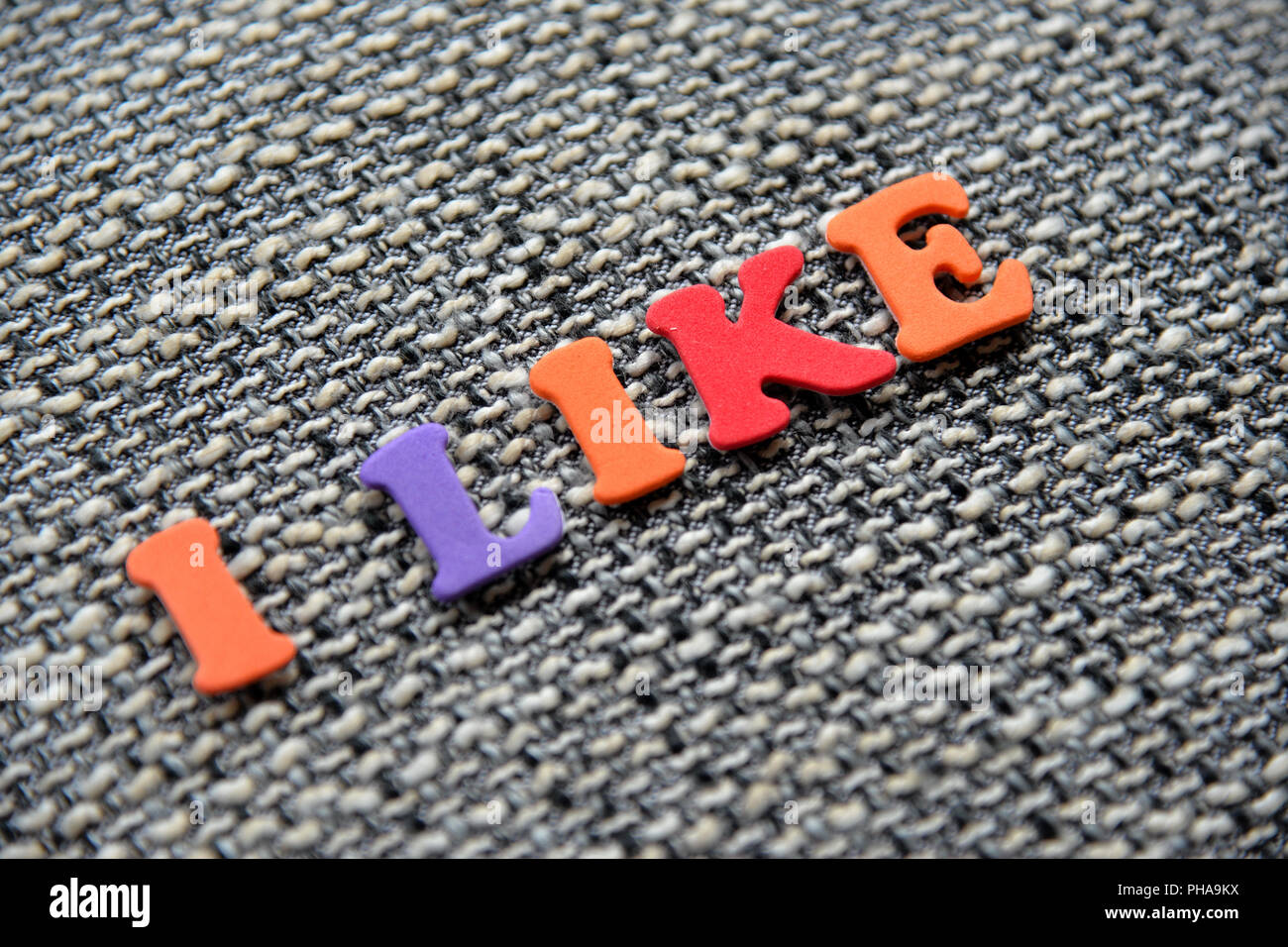 i Like On Fabric Background Stock Photo - Alamy
