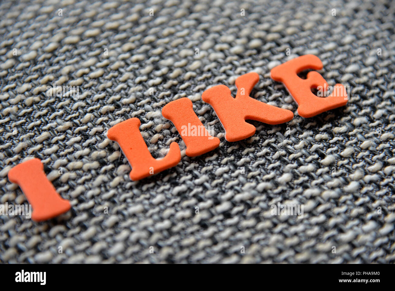 I Like On Fabric Background Stock Photo - Alamy