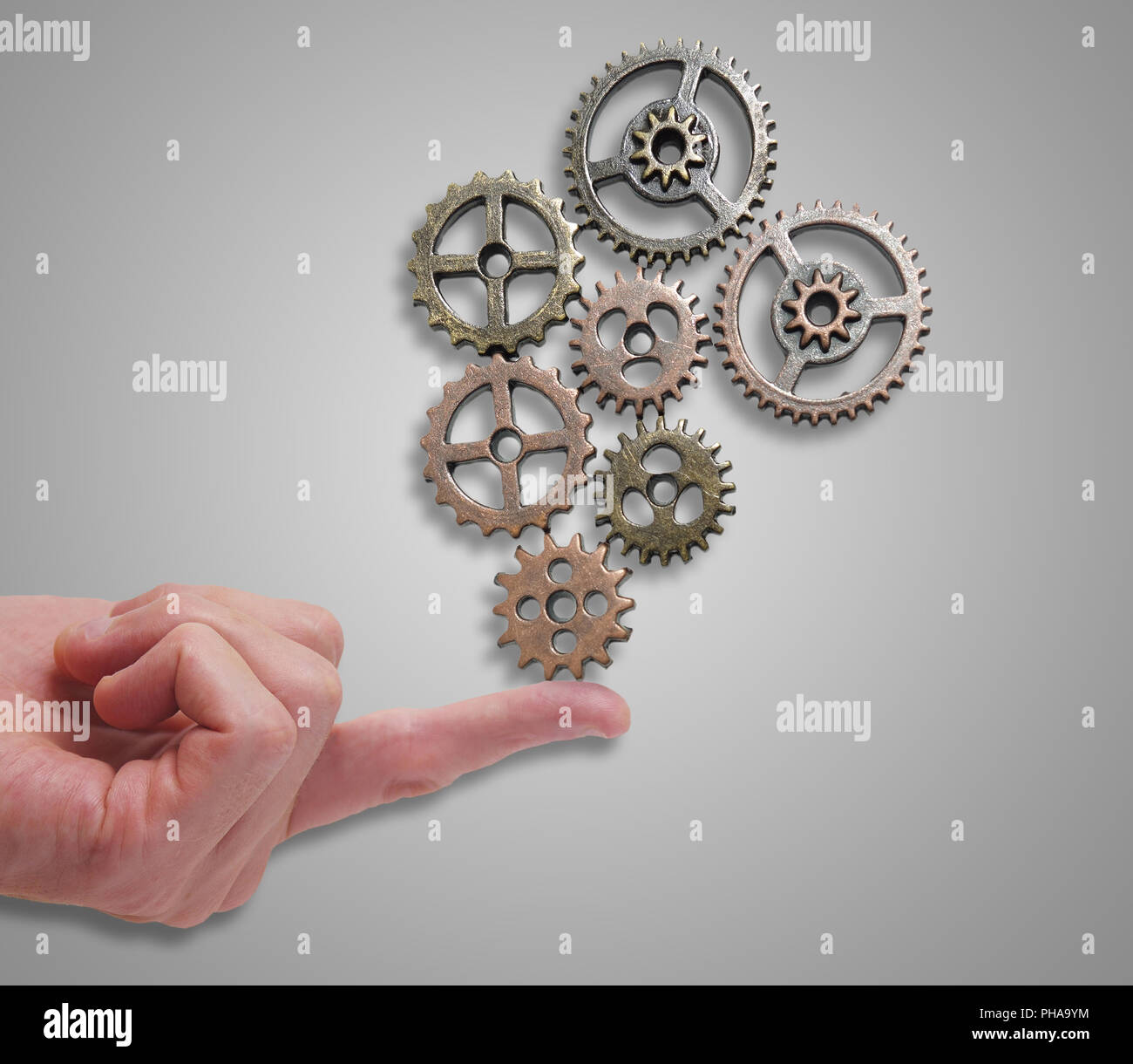 Finger tip gears Stock Photo - Alamy