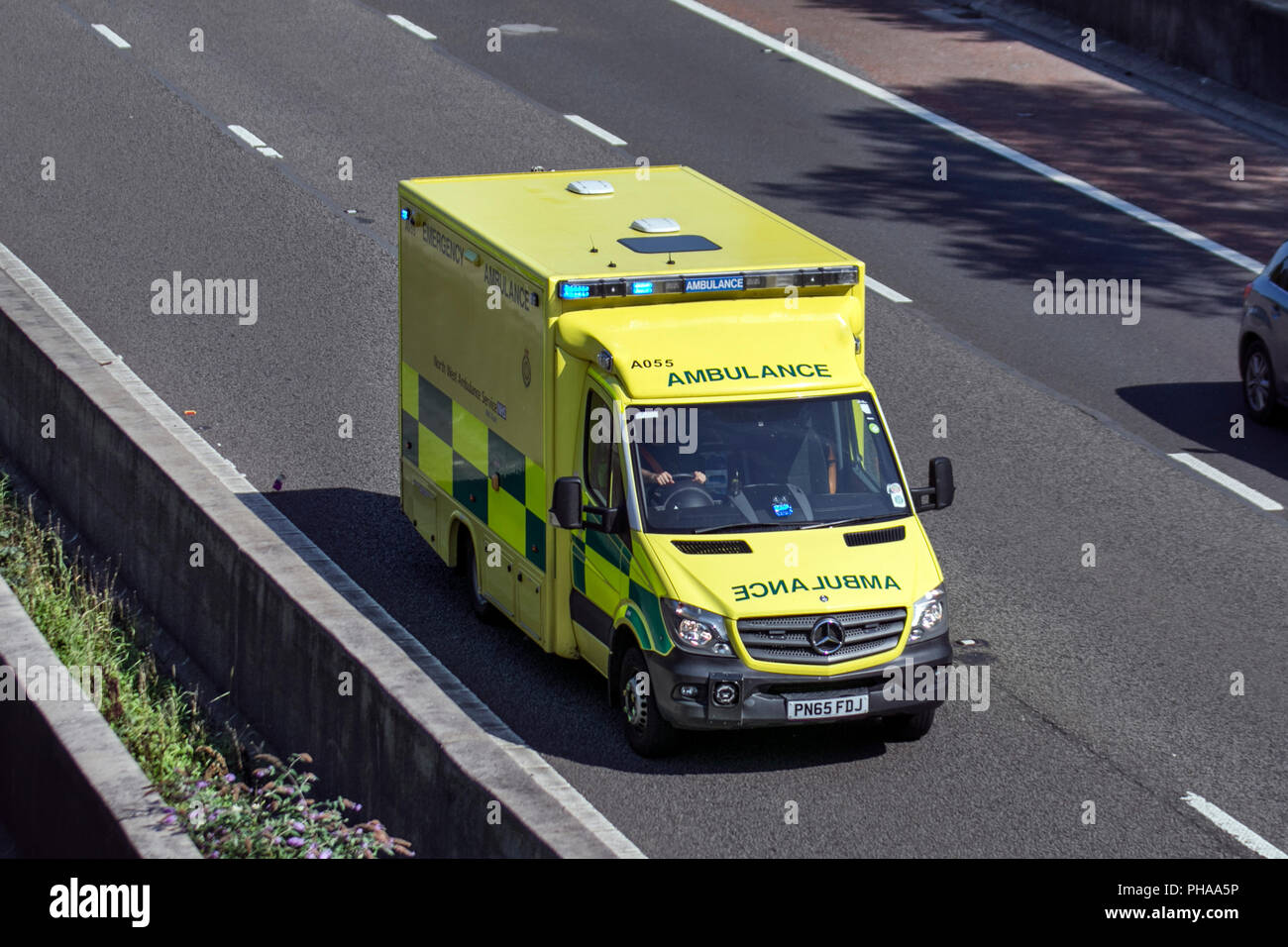 NHS North West Ambulance emergency response service vehicle, emergency ...