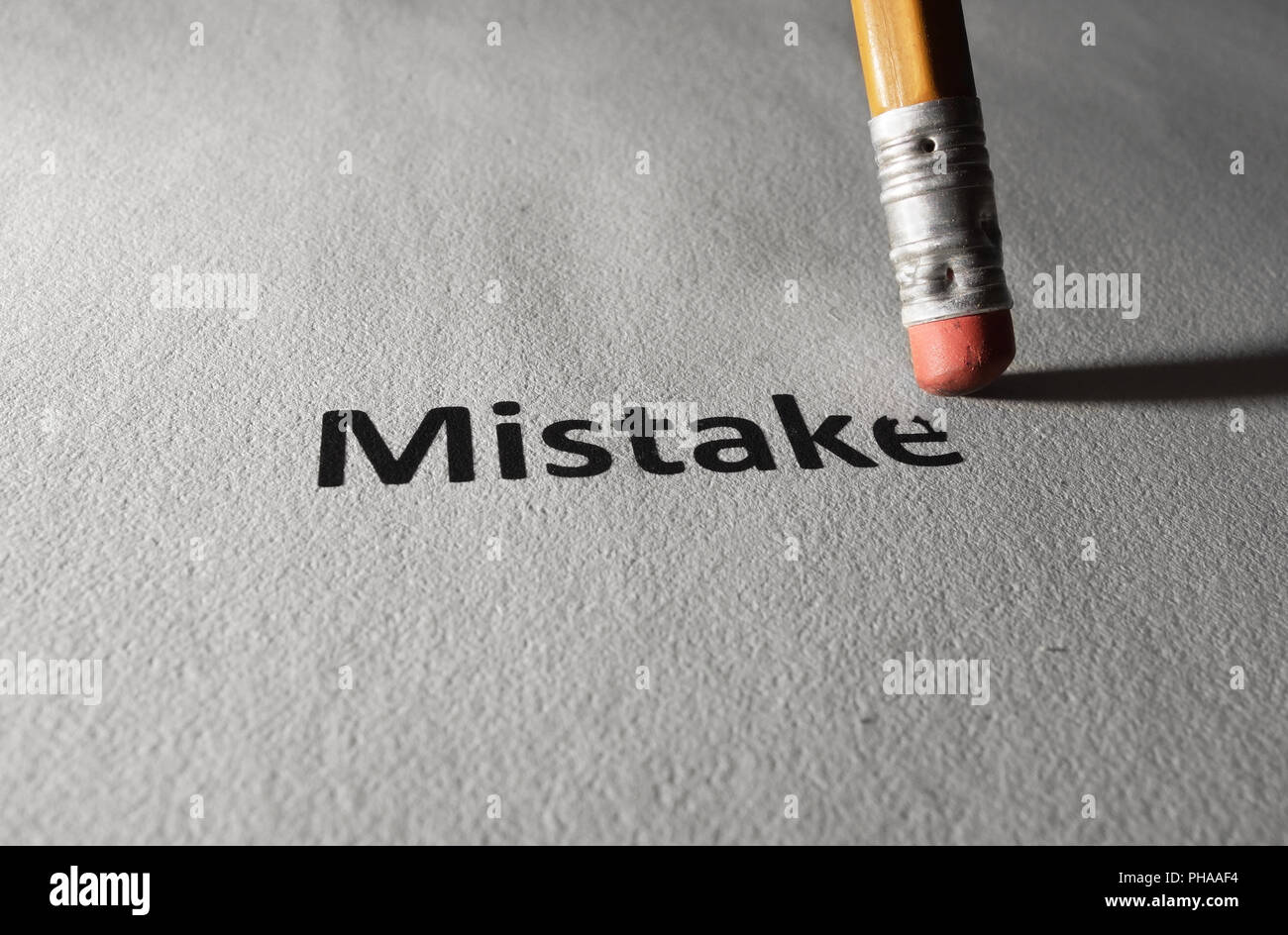 Fixing a mistake Stock Photo - Alamy