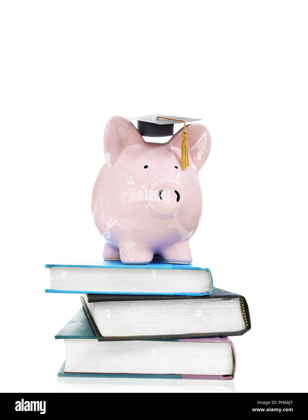 books and graduation piggy bank Stock Photo - Alamy