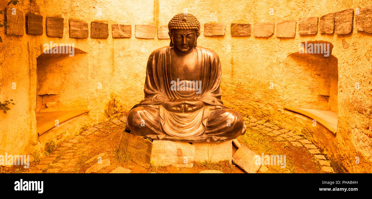 Meditating standing buddha hi-res stock photography and images - Alamy