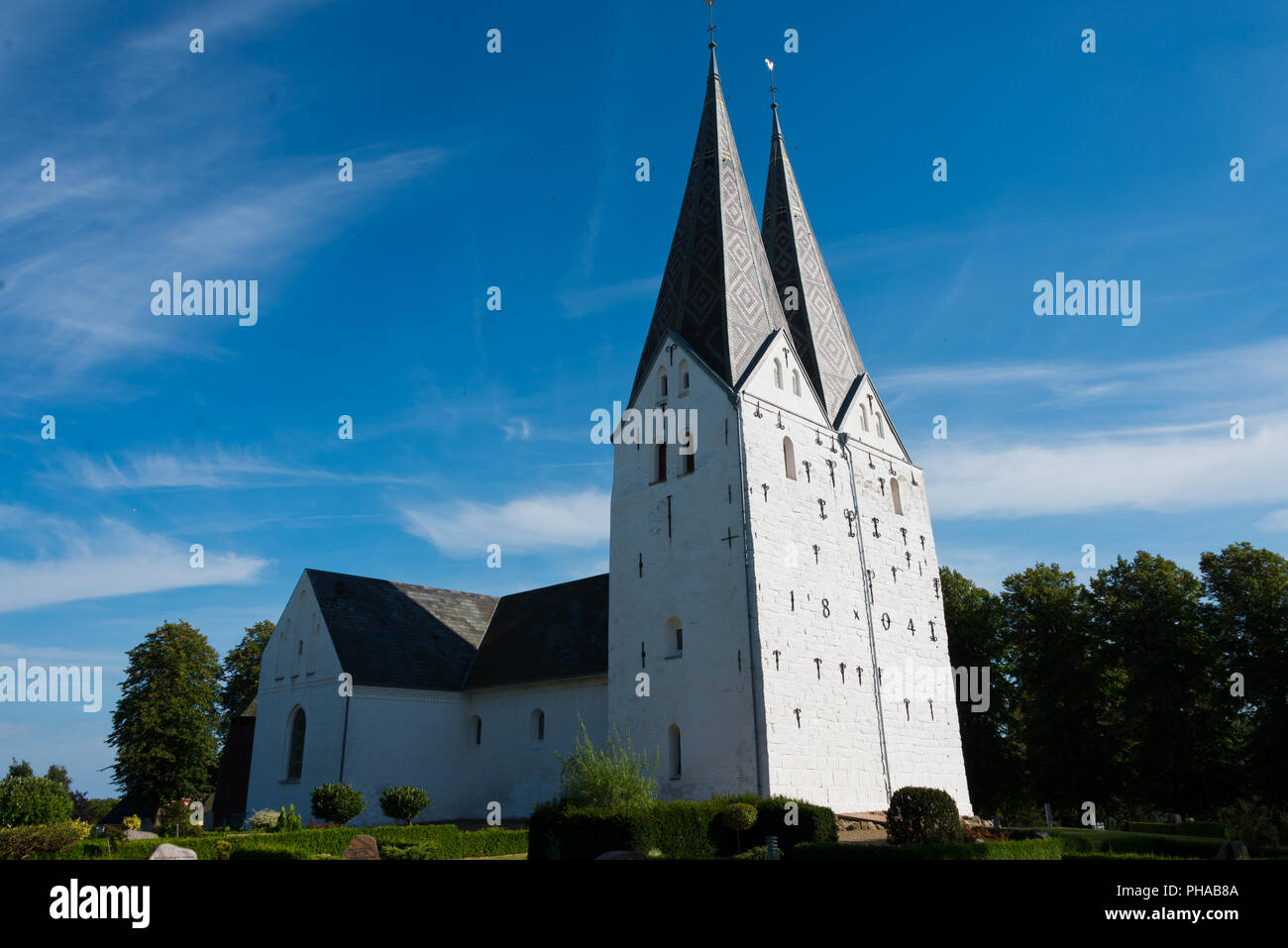 white medieval church in rural denmark Stock Photo - Alamy
