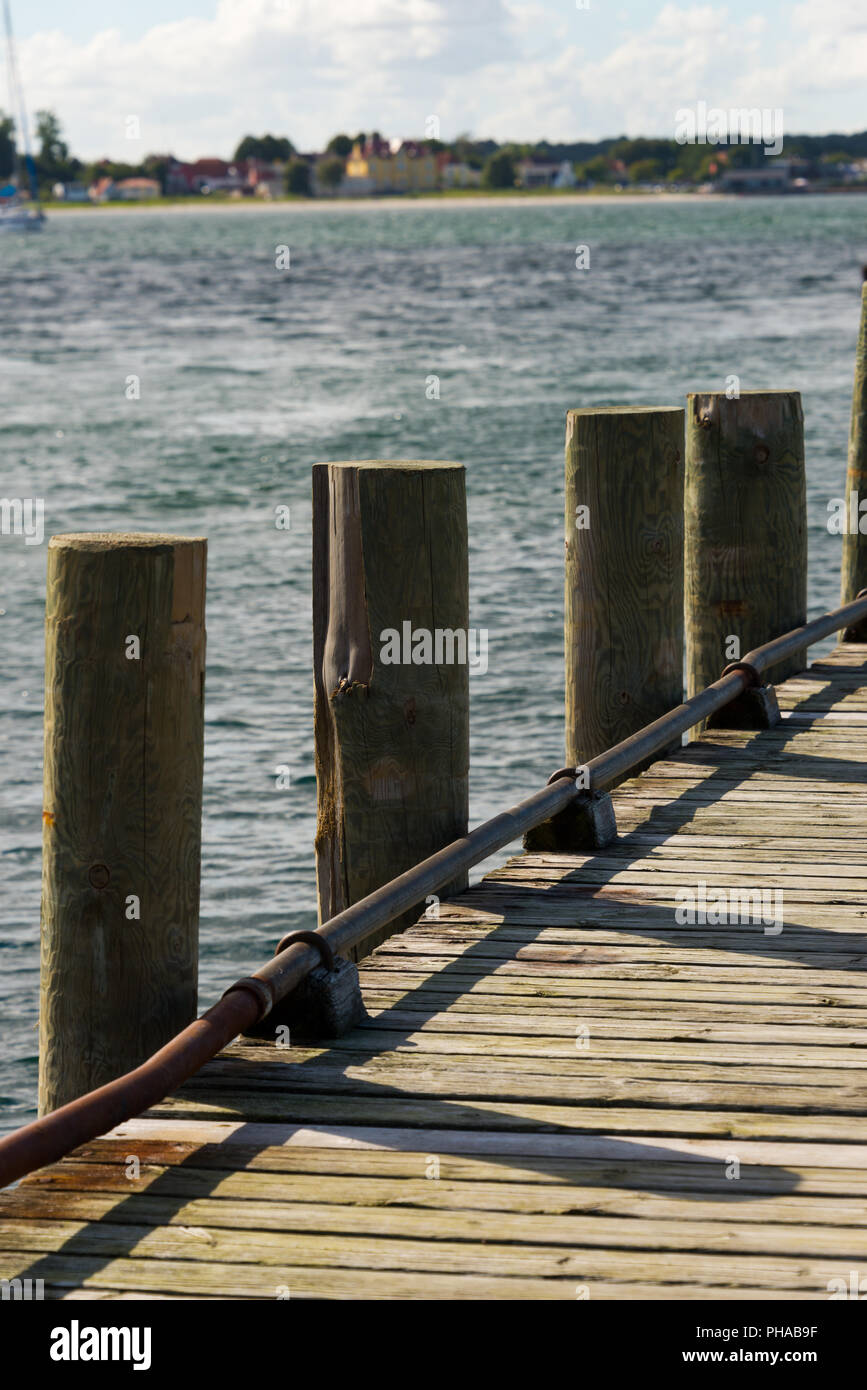 sunny boat jetty on Årø island, Denmark Stock Photo - Alamy