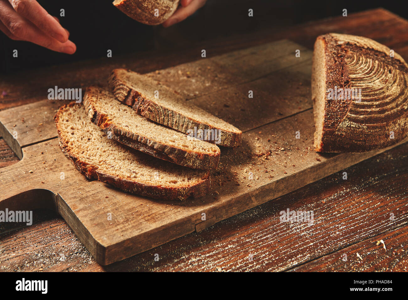 Hand knife sliced bread on hi-res stock photography and images - Alamy