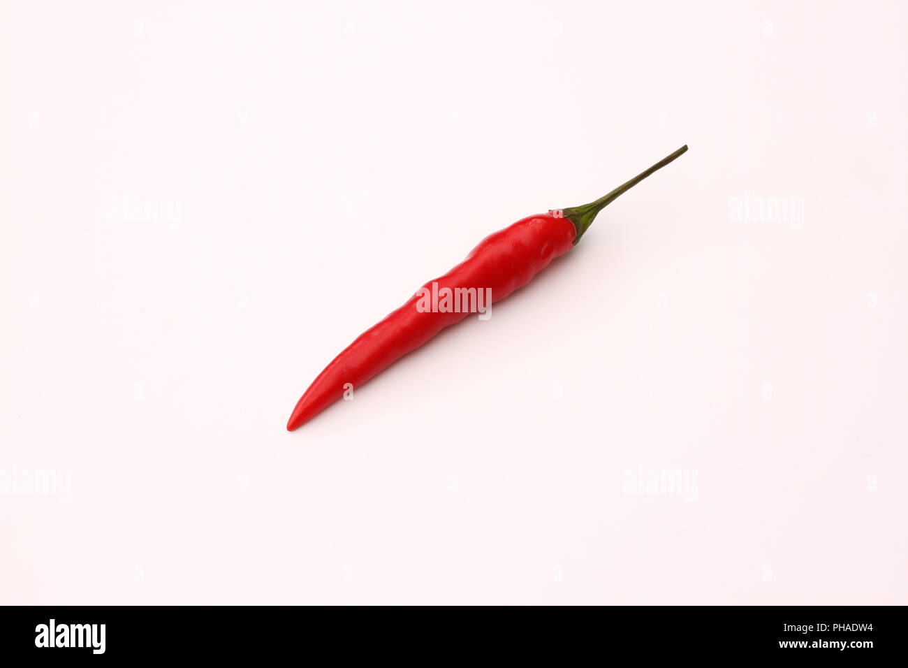 Red Chili Pepper on white background isolated Stock Photo - Alamy