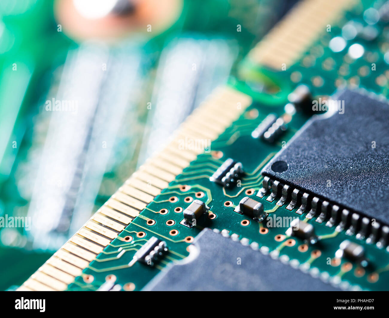 close-up of circuit board with integrated circuits, resistors and ...