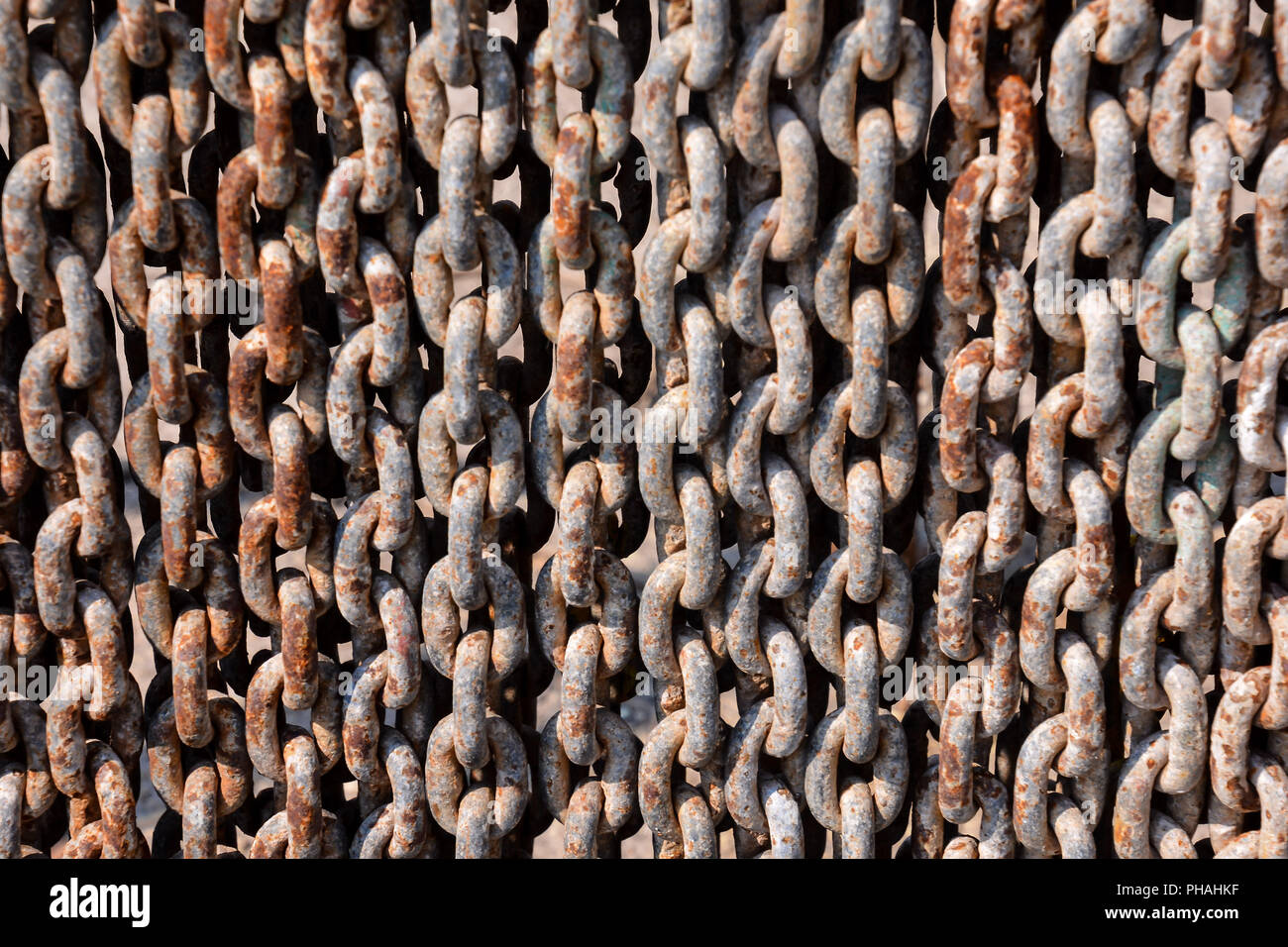 Rusty chain background Stock Photo - Alamy