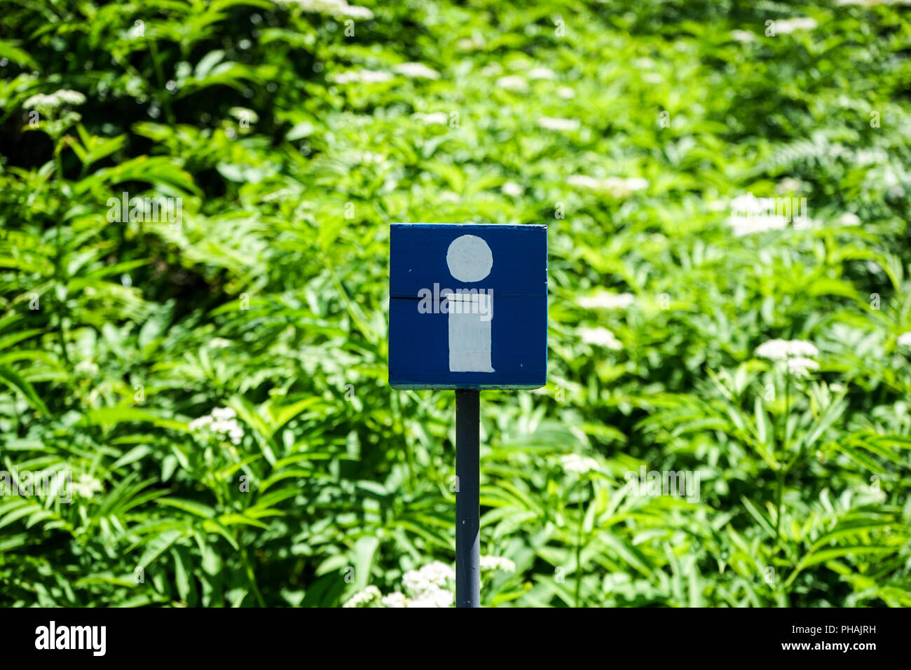blue and white icon sign for tourist information Stock Photo - Alamy