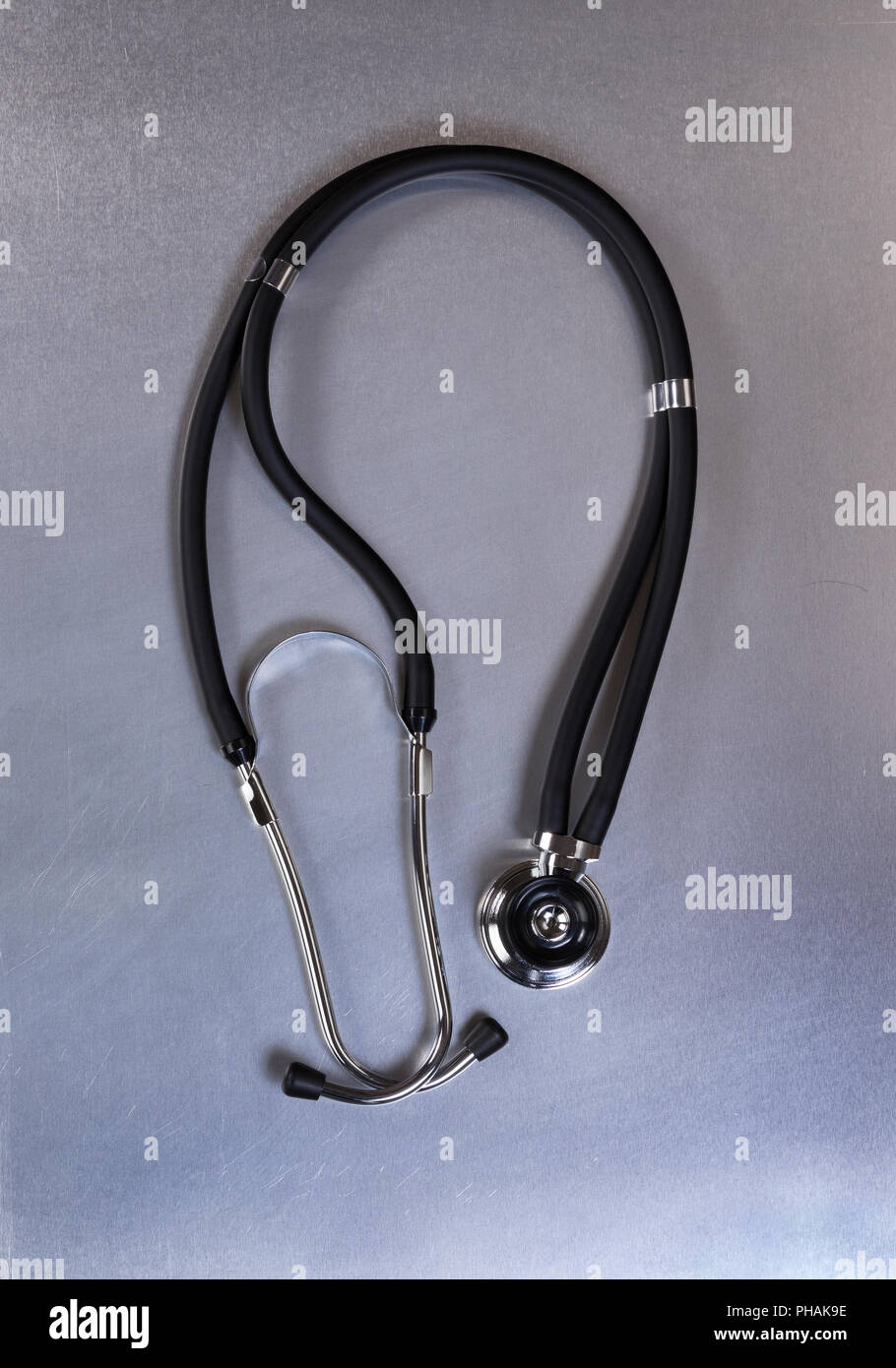 Medical stethoscope on stainless steel table in vertical layout Stock ...