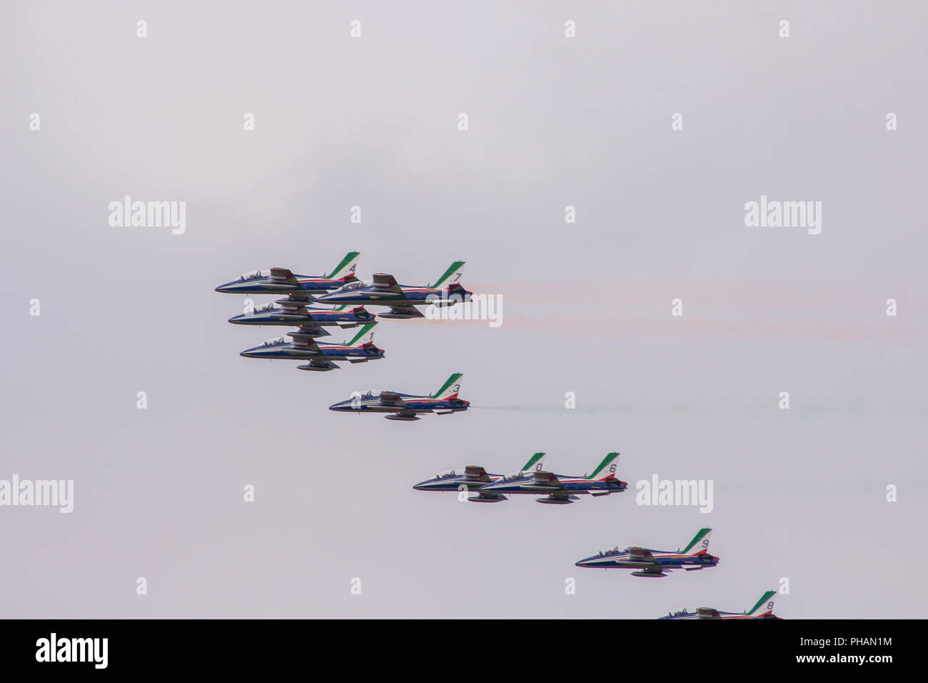 Aerobatic team performs flight, Planes flying in formation, Air show ...