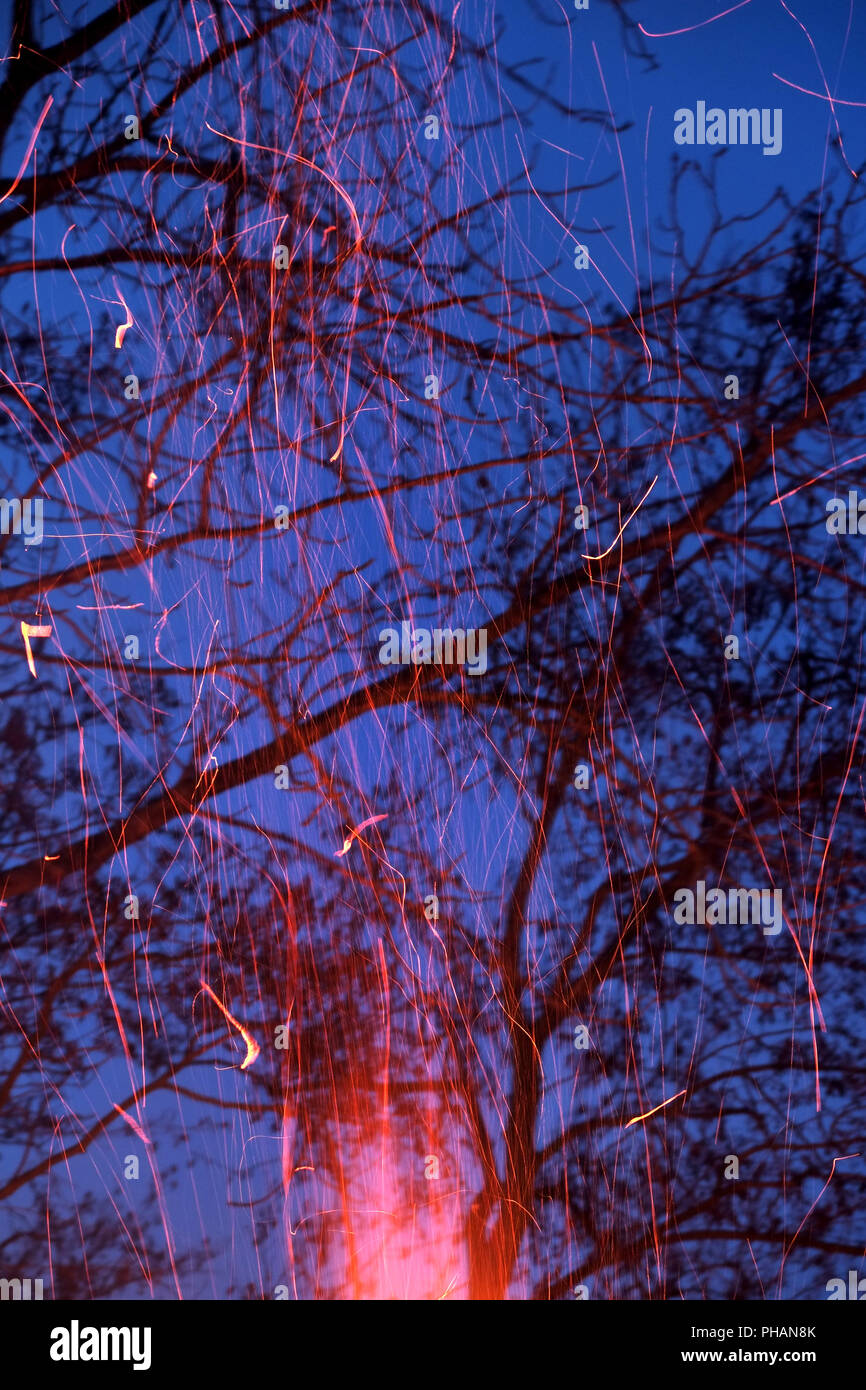 Flying sparks, Fire Stock Photo - Alamy