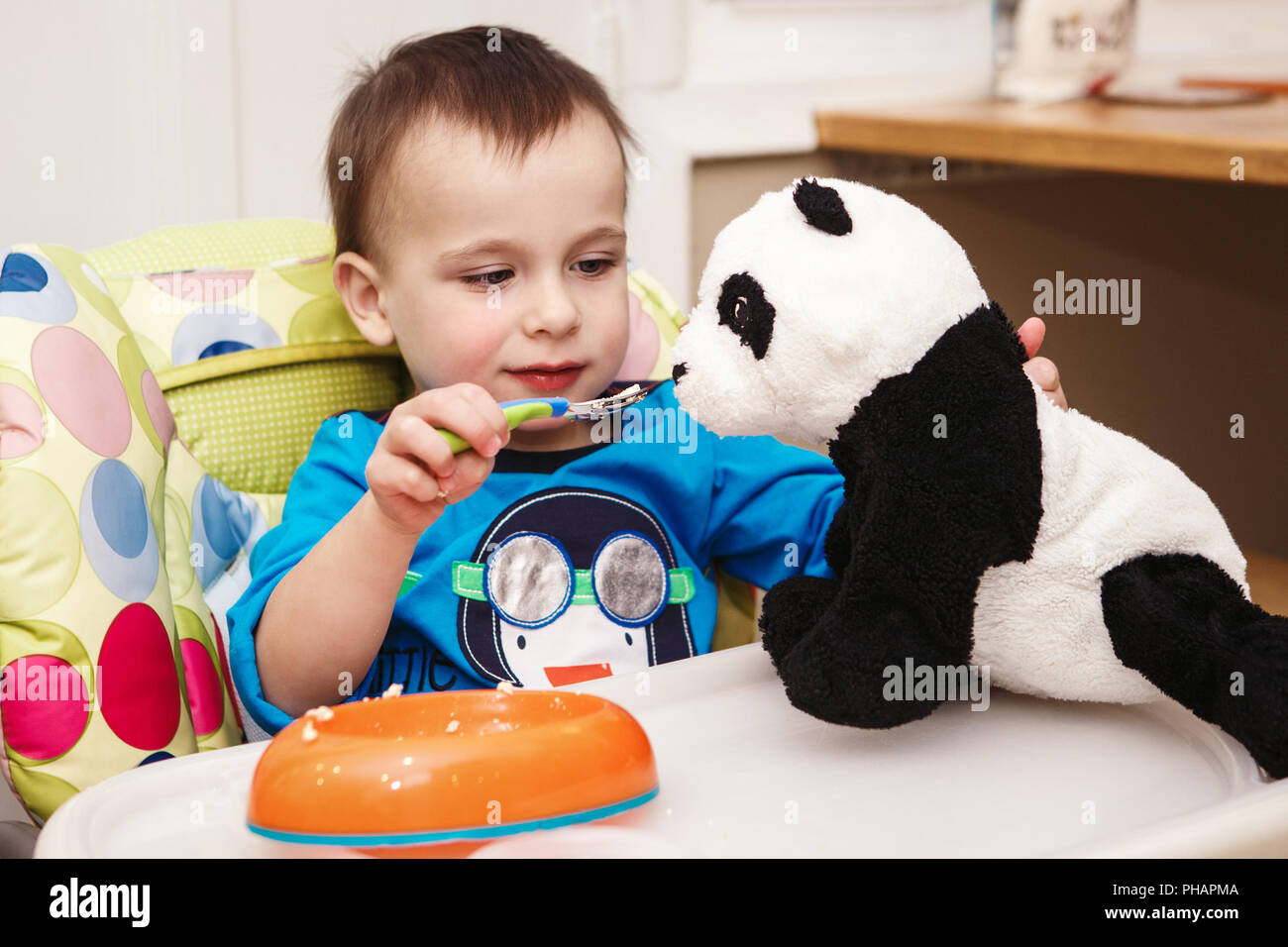 Greedy toddler hi-res stock photography and images - Alamy