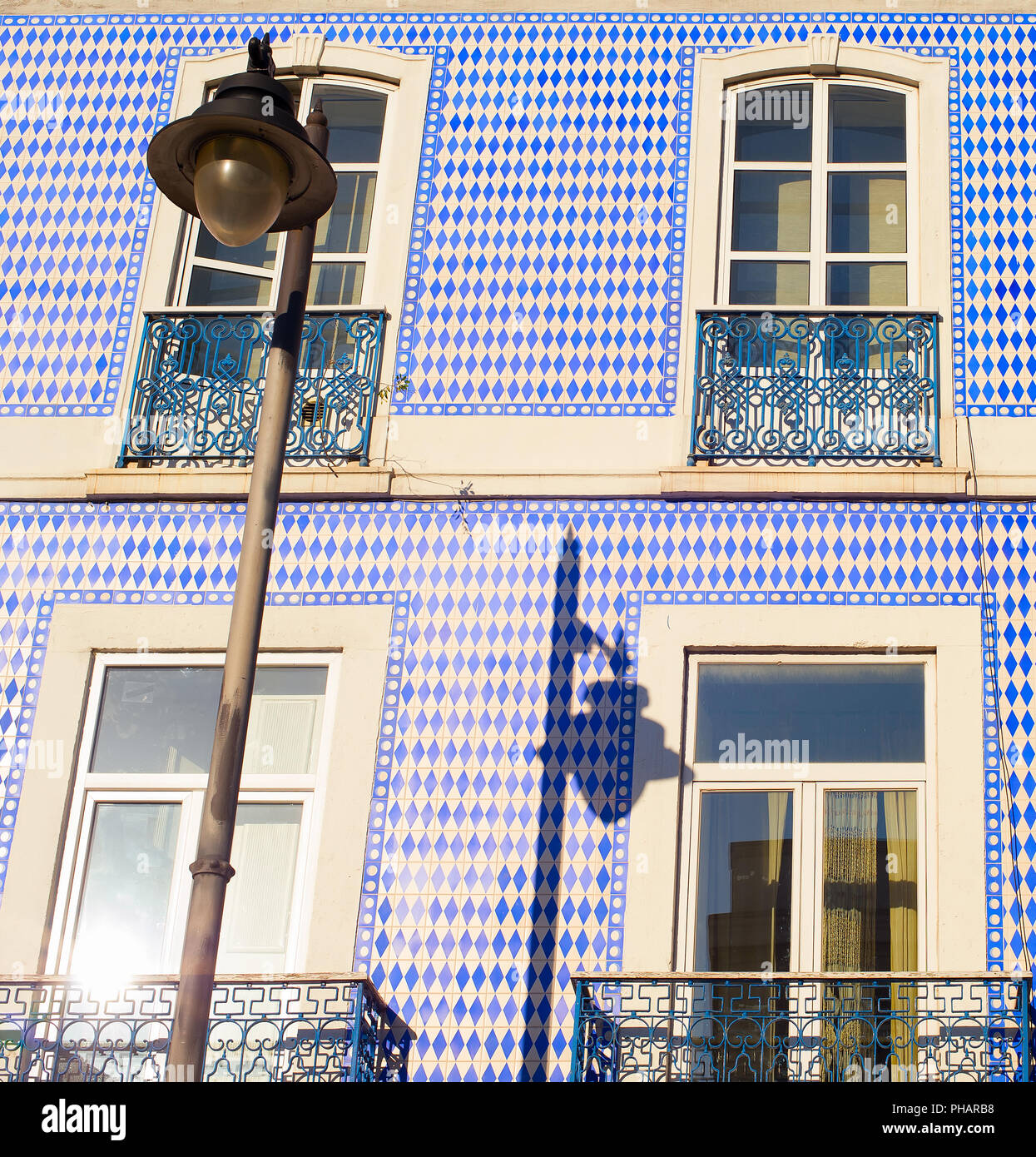 Traditional Portugal tiled building wall Stock Photo - Alamy