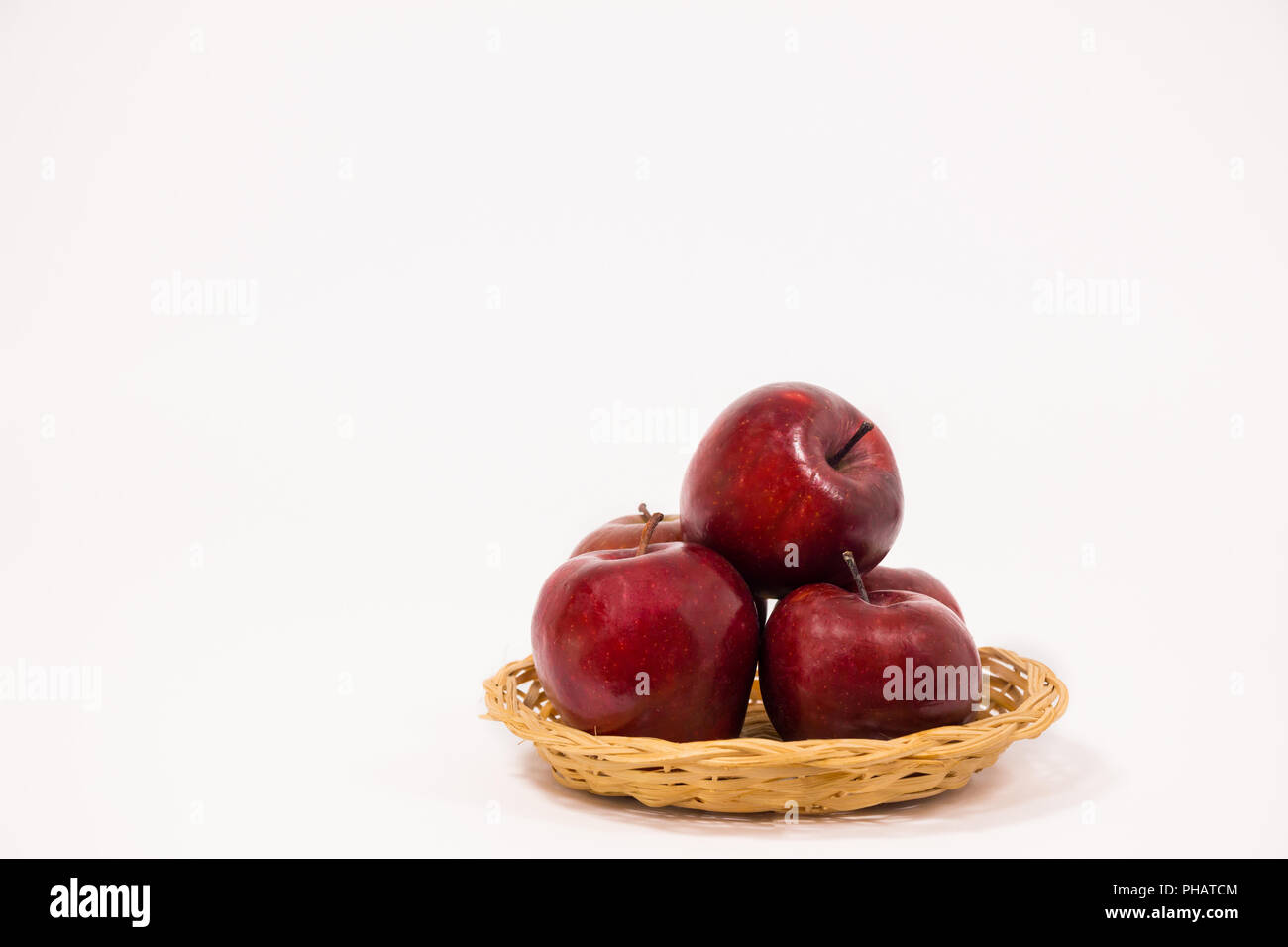 Red apples in basket on hi-res stock photography and images - Alamy